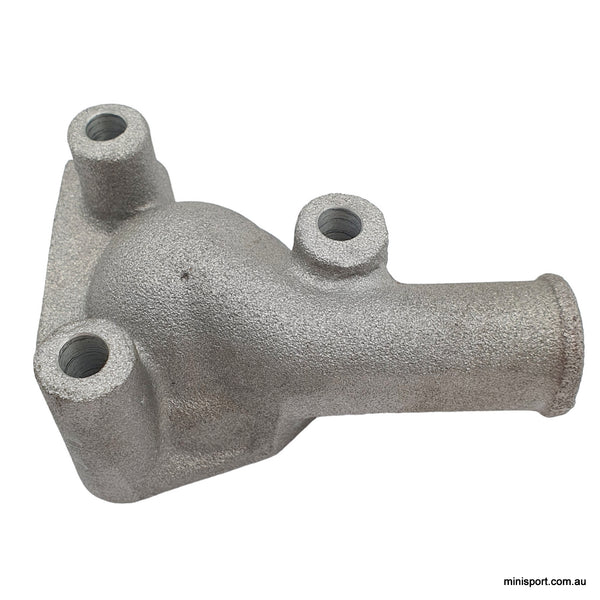 Mini/moke 'late model' 1275 rear facing thermostat housing *BACK IN ...
